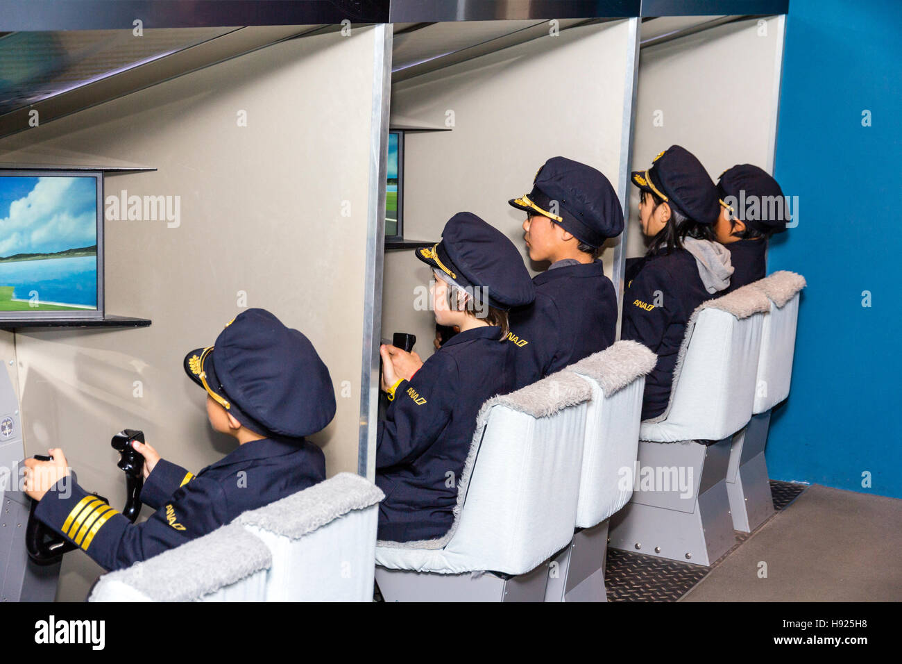 Japan, Nishinomiya, KidZania, child activity centre. Row of ANA Flight ...