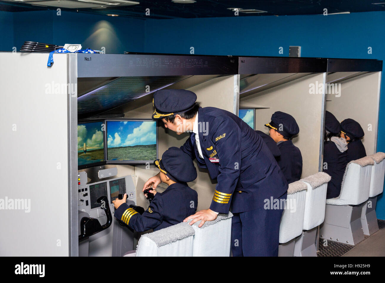 Japan, Nishinomiya, KidZania, child activity centre. Row of ANA Flight ...