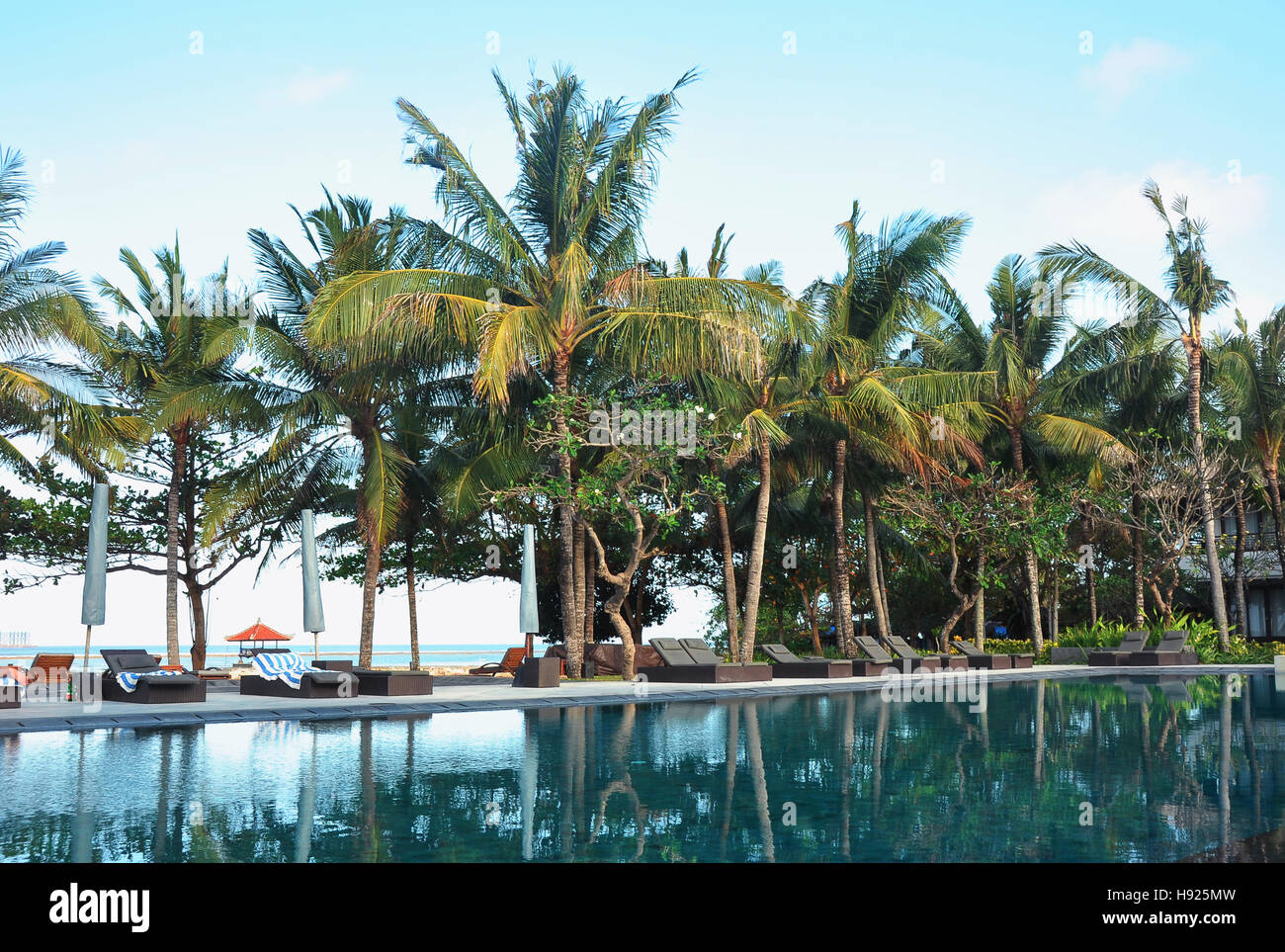 rest on a lounger by the pool Stock Photo - Alamy