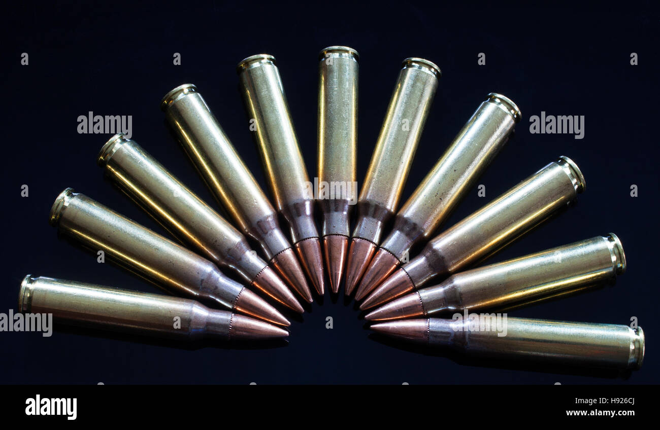 Rifle ammunition that has bullets with steel cores on a black ...