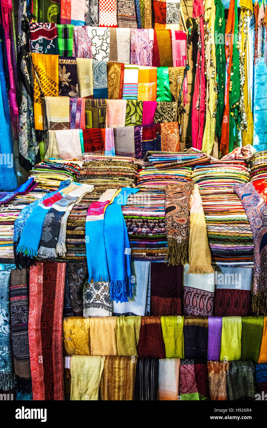 A scarf and textile stall at the night market or souk in Luxor in Egypt ...