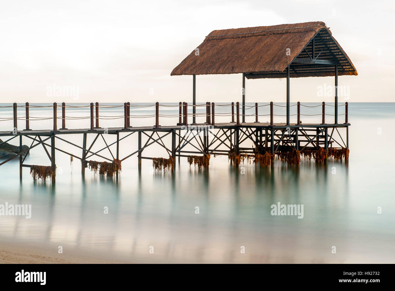Jetty in the coastal waters of western Mauritius Stock Photo - Alamy
