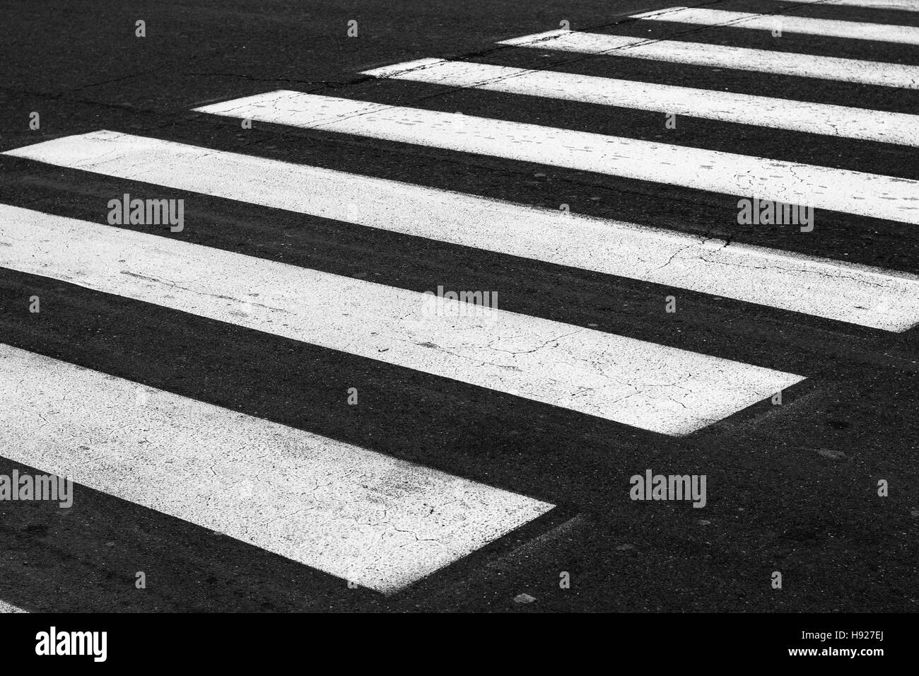 White painted pedestrian crossing on the road Stock Photo - Alamy