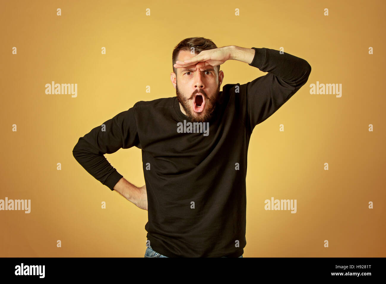 Portrait of young man with happy facial expression Stock Photo - Alamy