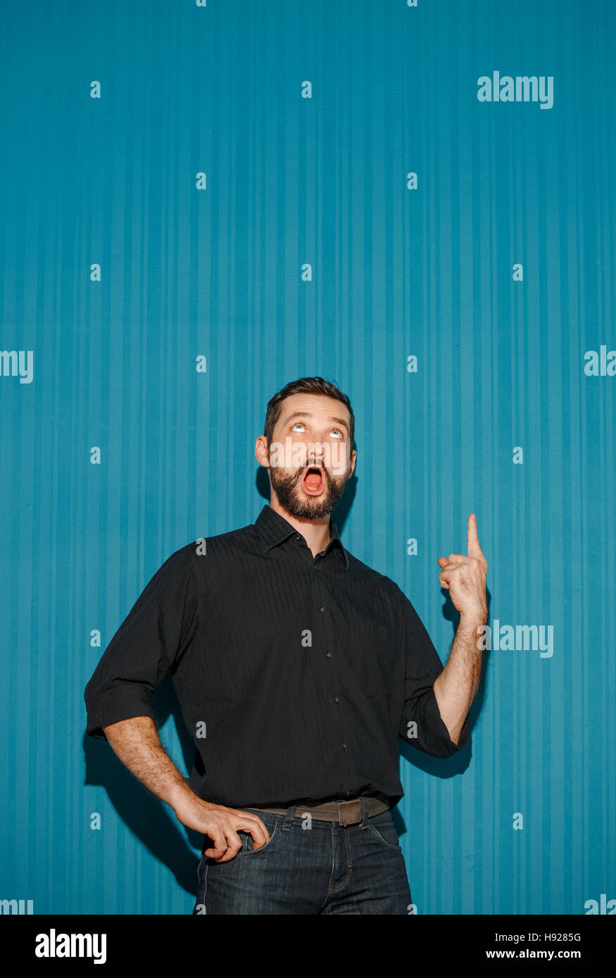 Portrait of young man with happy facial expression Stock Photo - Alamy