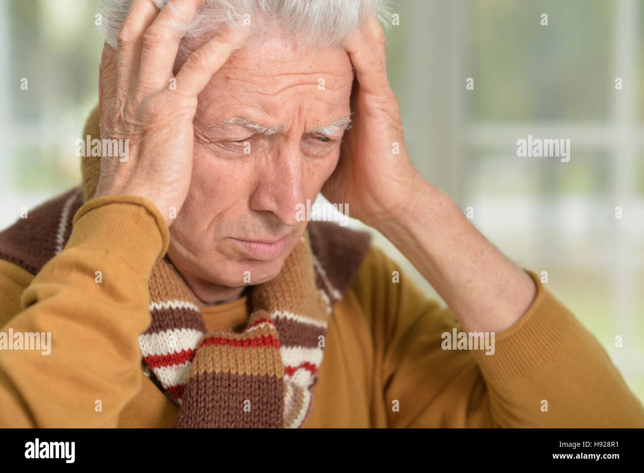 Stressed senior man Stock Photo - Alamy