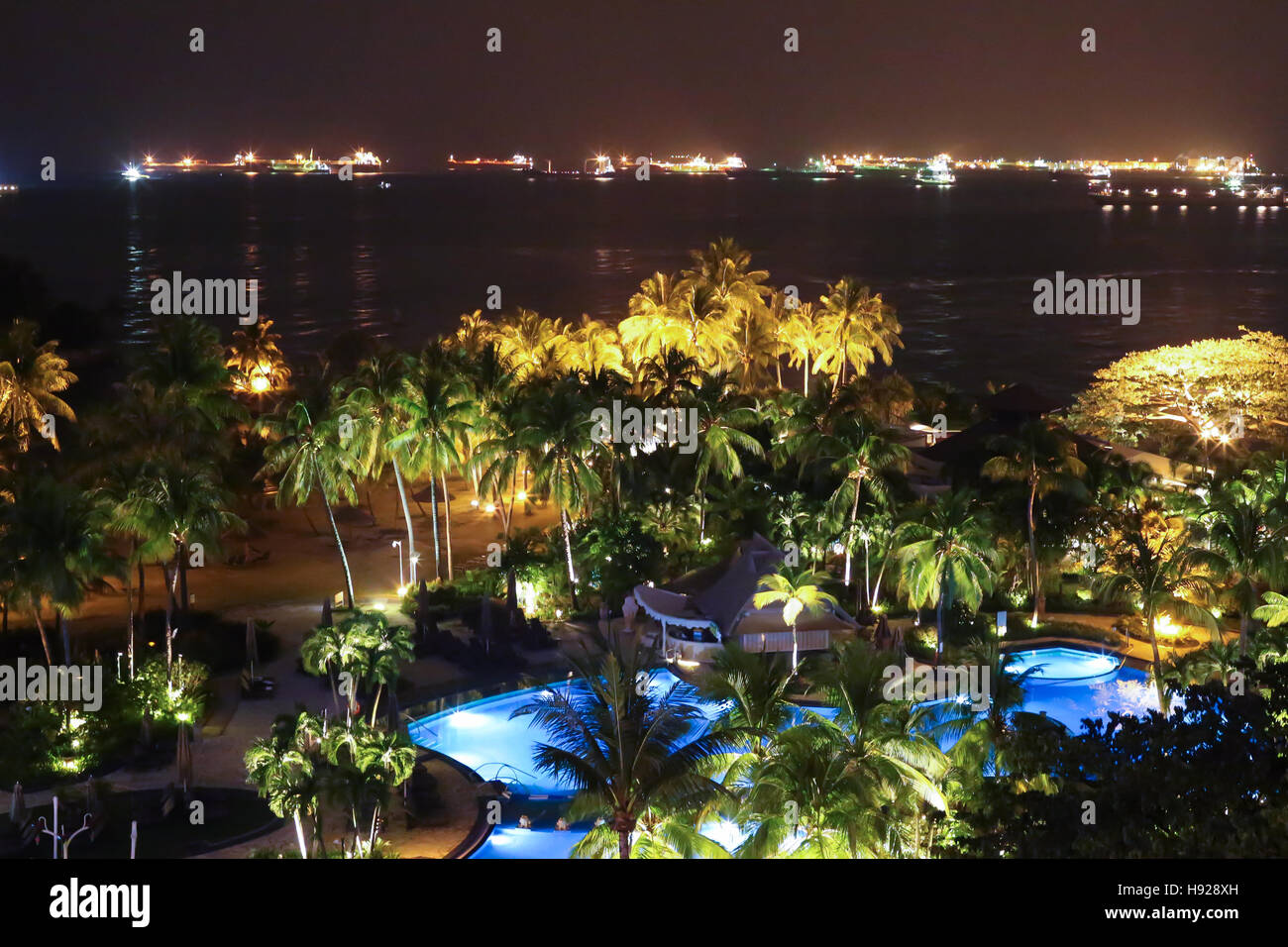 Night view on sea port near the island Stock Photo - Alamy