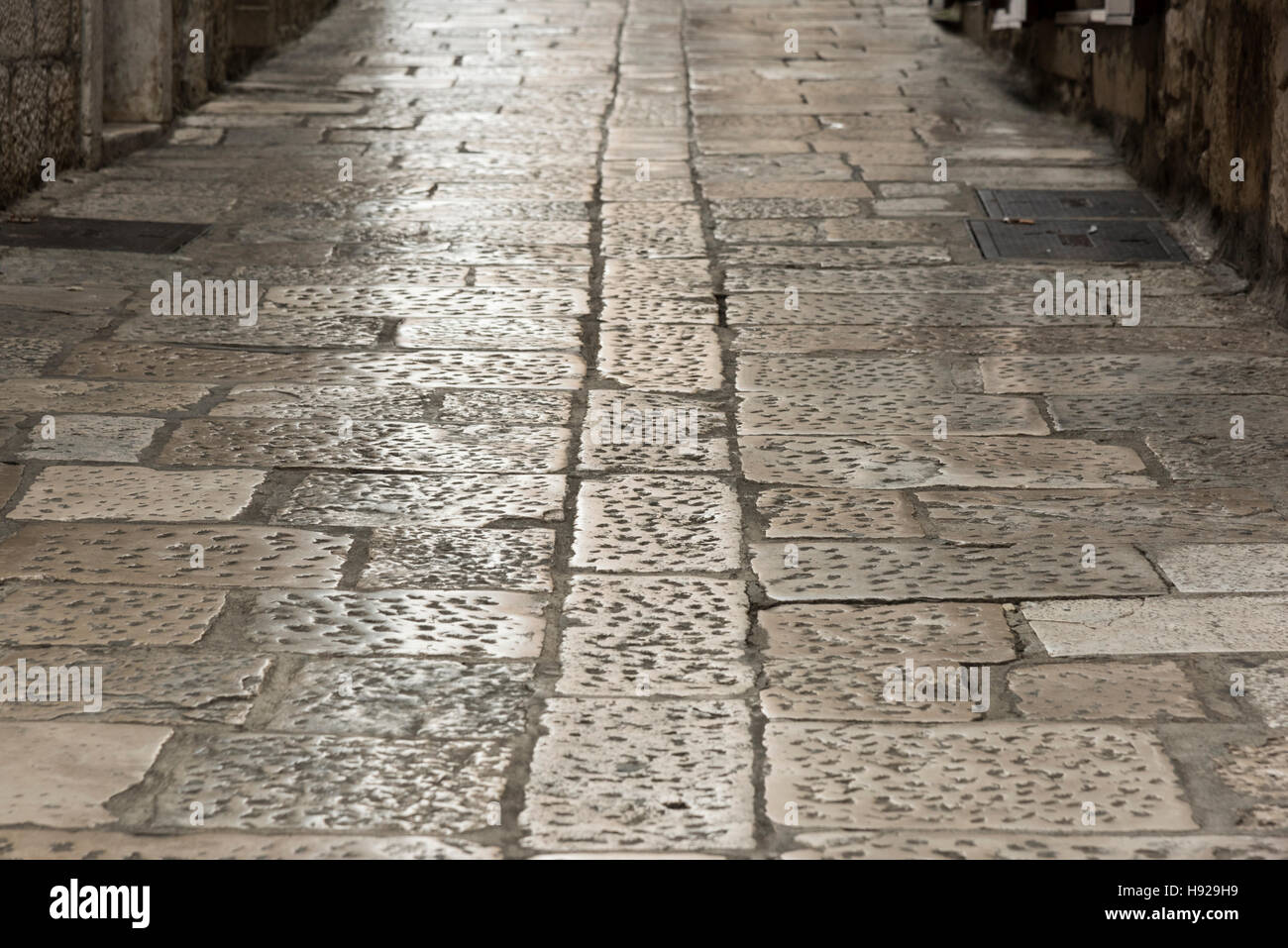 A close up of ancient marble pavement and street in Korcula Croatia ...