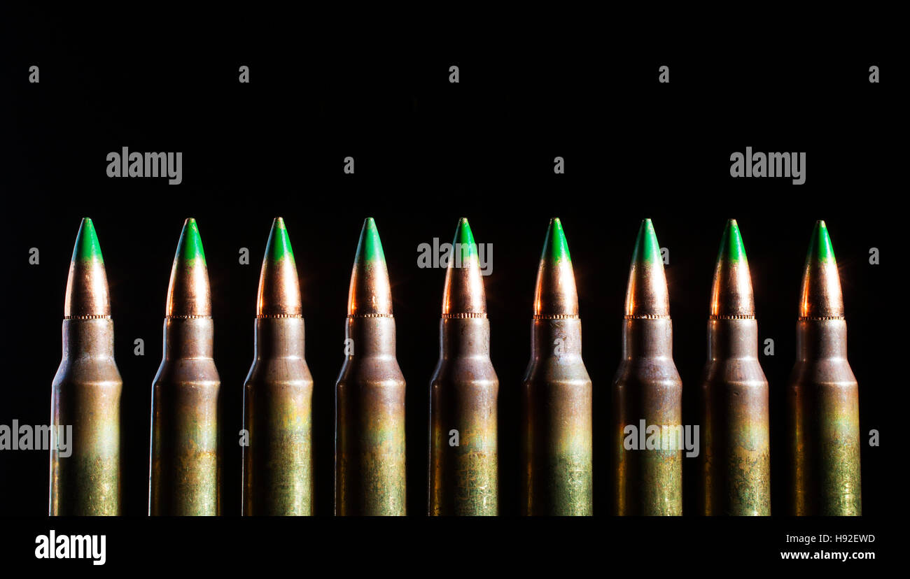 Green tipped bullets with steel insterts and the cartridges Stock Photo ...