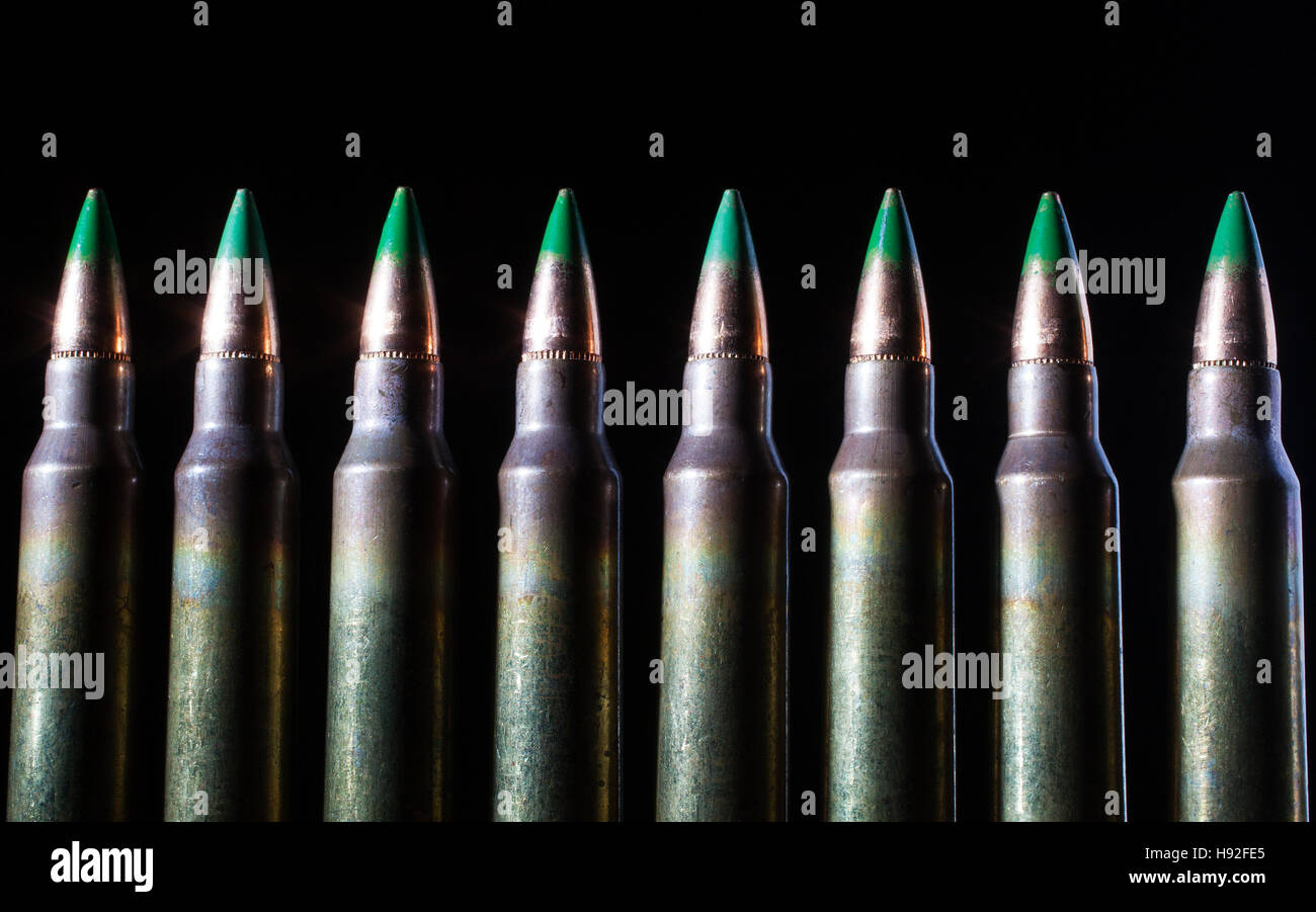 Cartridges with bullets that have green tips and steel inside Stock ...