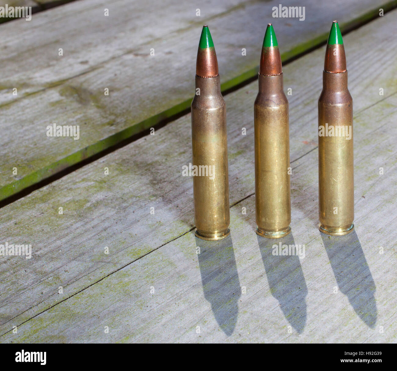 Cartridges that are loaded with green tipped bullets Stock Photo - Alamy