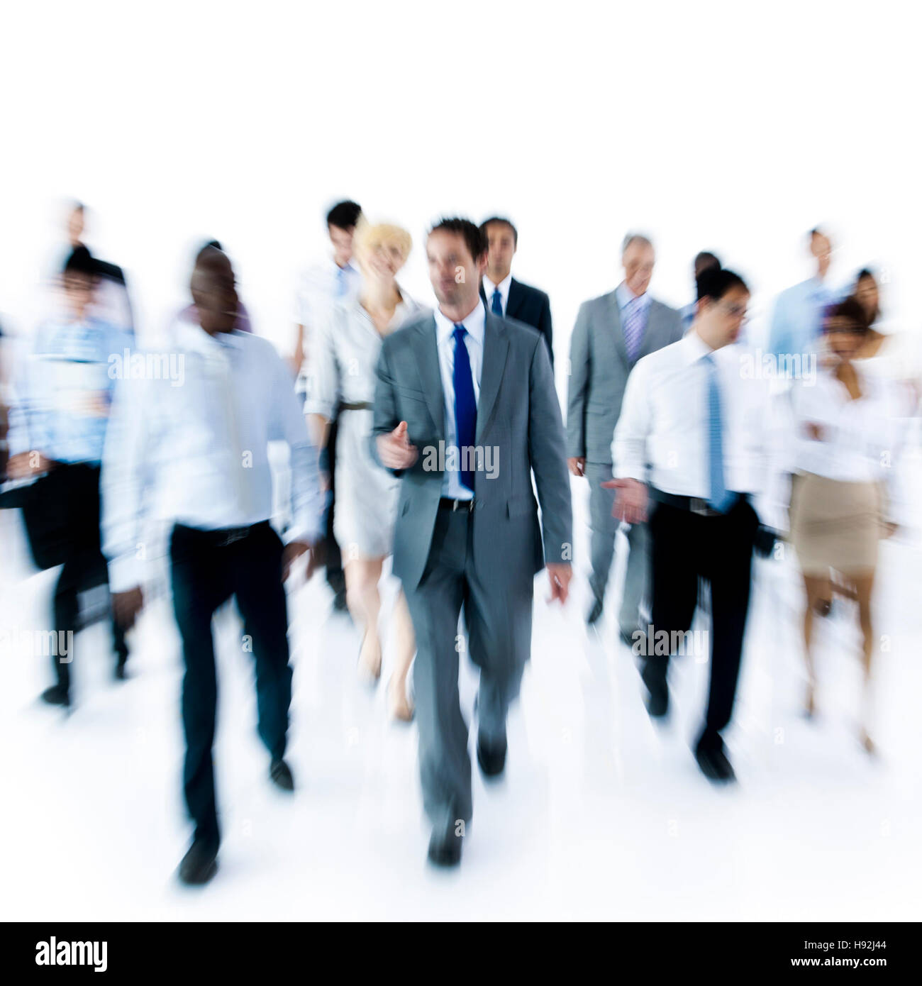 Large Group of Business People Walking Stock Photo - Alamy