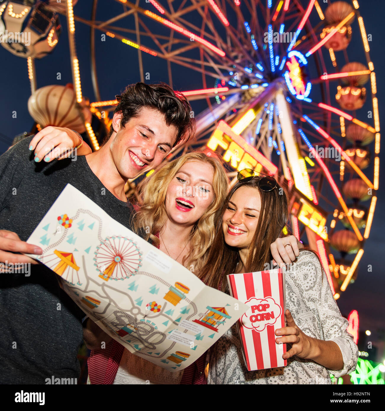 Amusement Park Friends Enjoyment Lifestyle Concept Stock Photo - Alamy