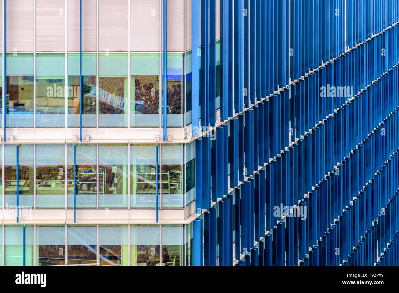 Modern office building with blue fin pattern Stock Photo - Alamy