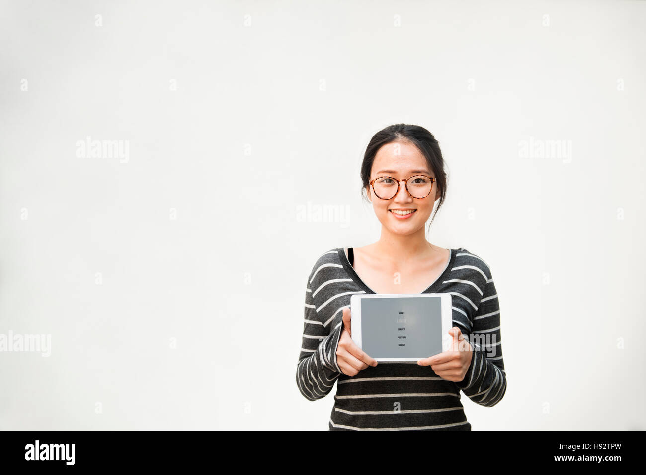 Asian Girl Connection Tablet Smiling Concept Stock Photo - Alamy