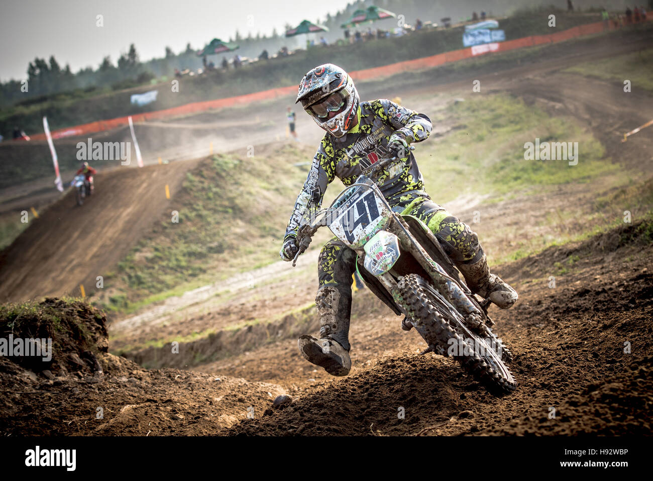 motocross rider in the race Stock Photo - Alamy