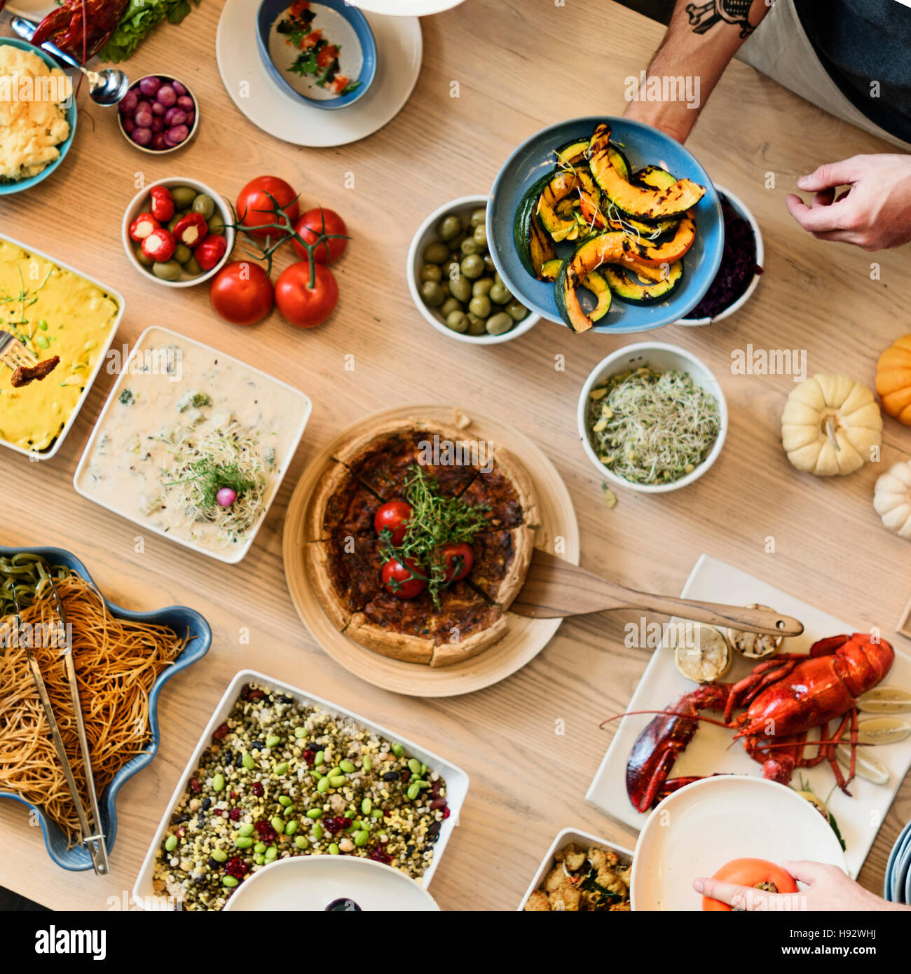 Friends Party Buffet Enjoying Food Concept Stock Photo - Alamy