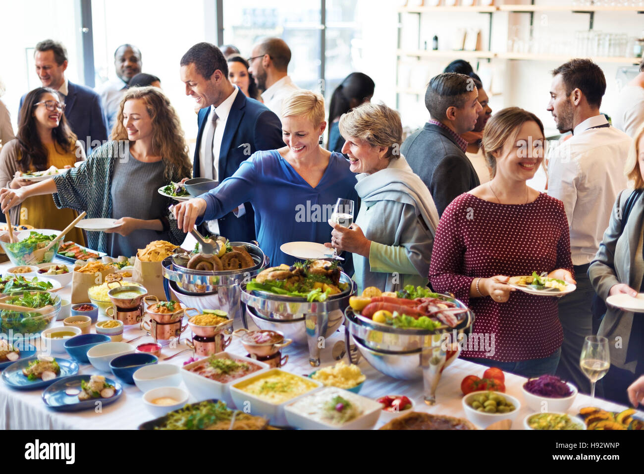 Diversity People Enjoy Buffet Party Concept Stock Photo - Alamy