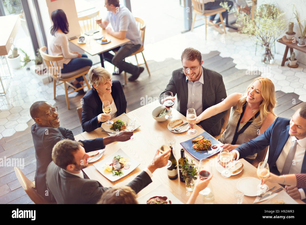 Business People Party Cheers Enjoying Food Concept Stock Photo - Alamy