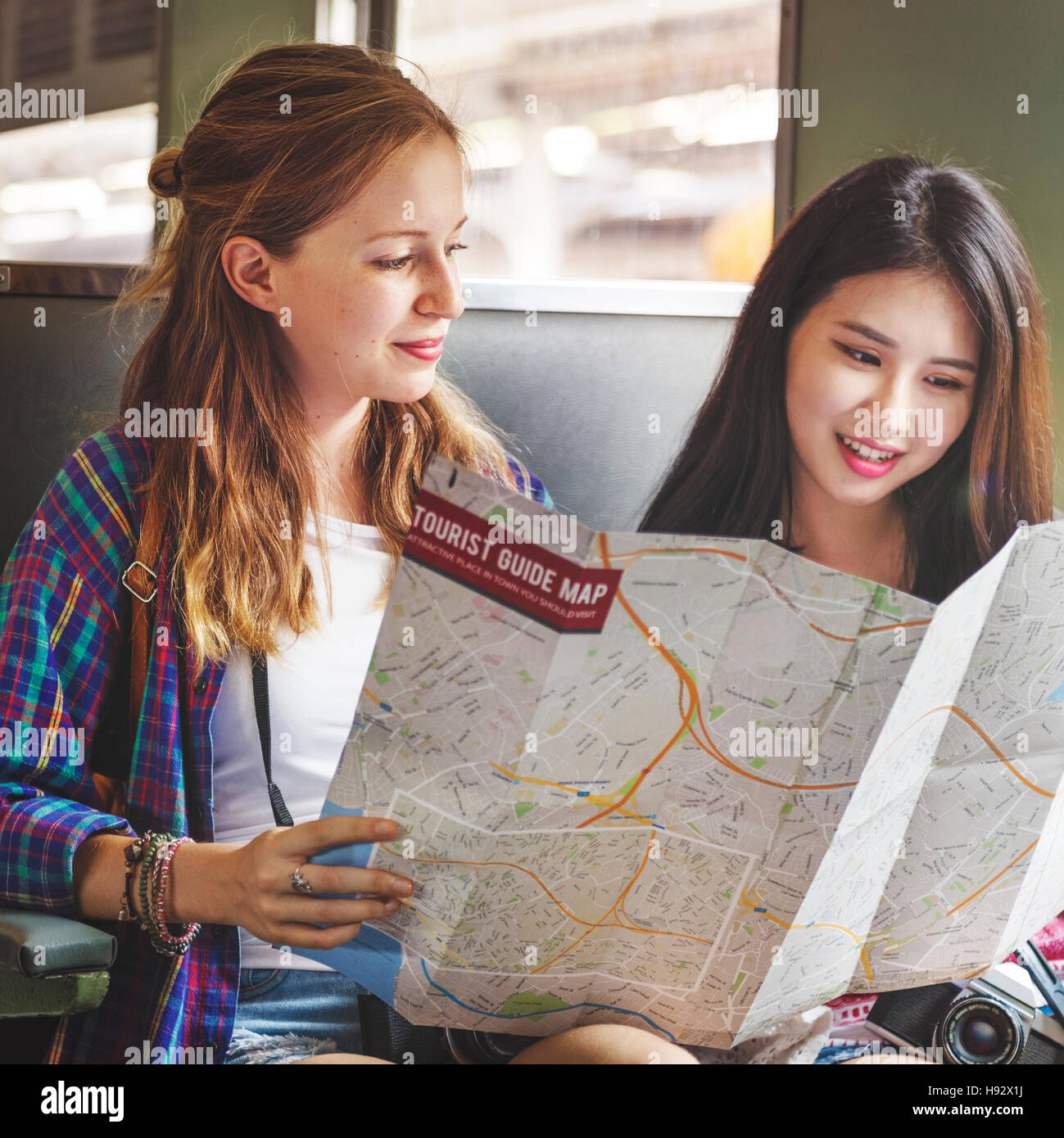 Girls Friendship Hangout Traveling Holiday Map Concept Stock Photo - Alamy