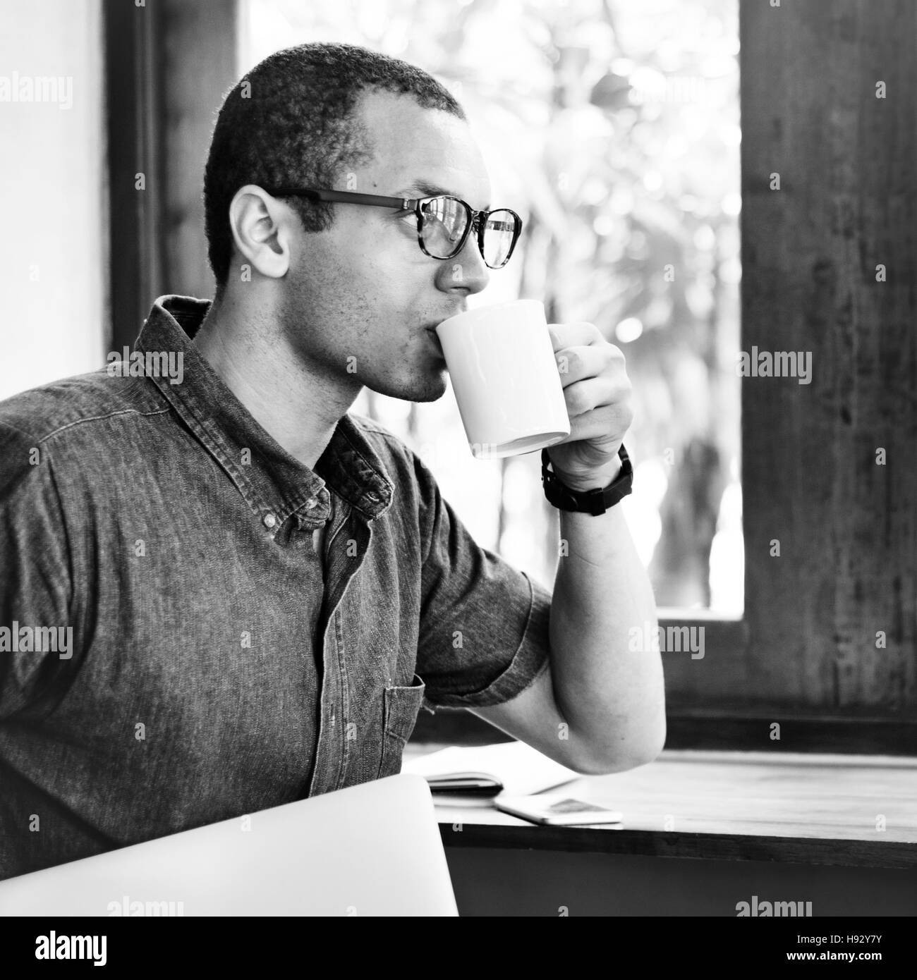 Drinking while working Black and White Stock Photos & Images - Alamy
