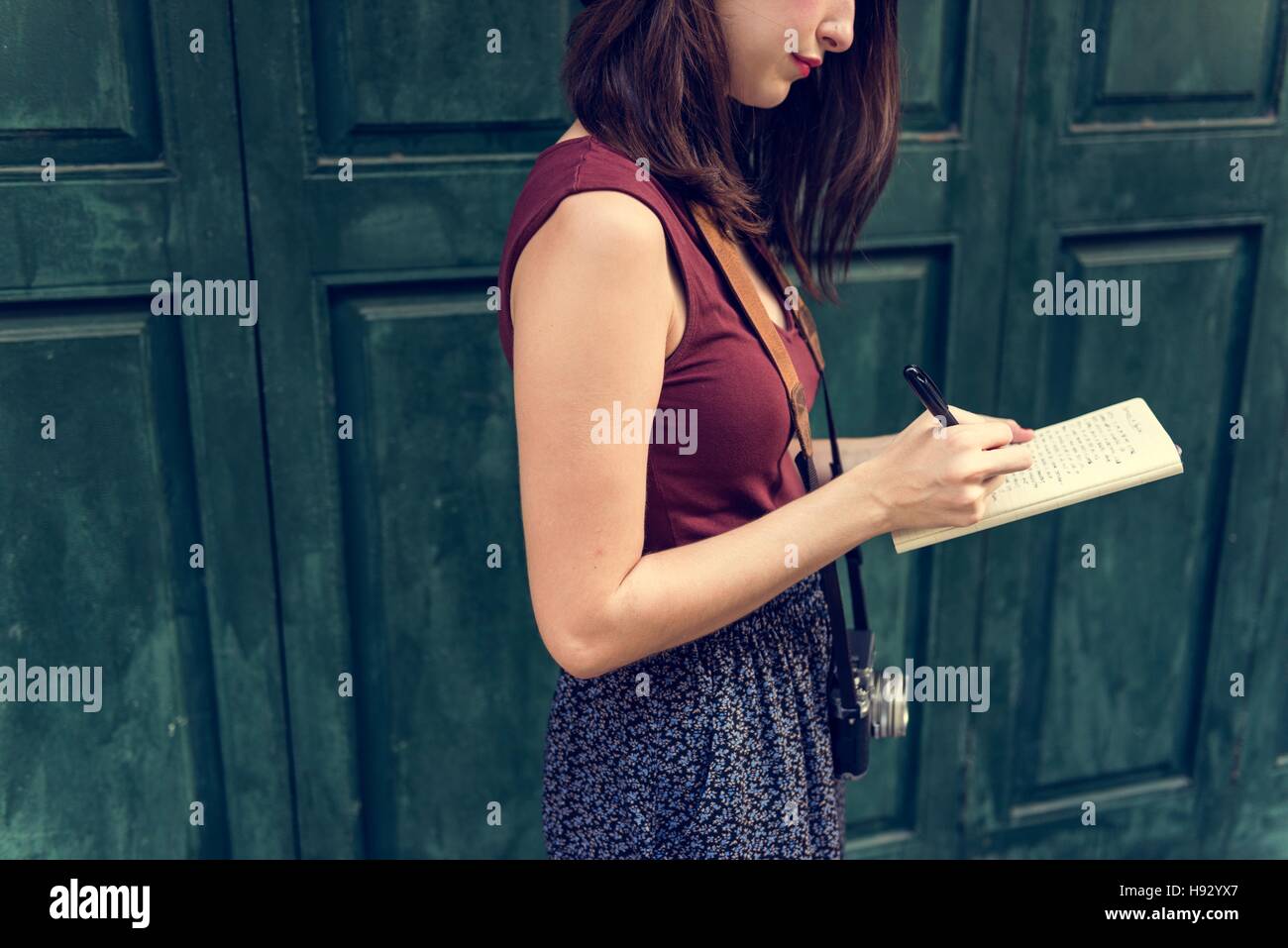 Woman Making Notes Outside City Concept Stock Photo - Alamy