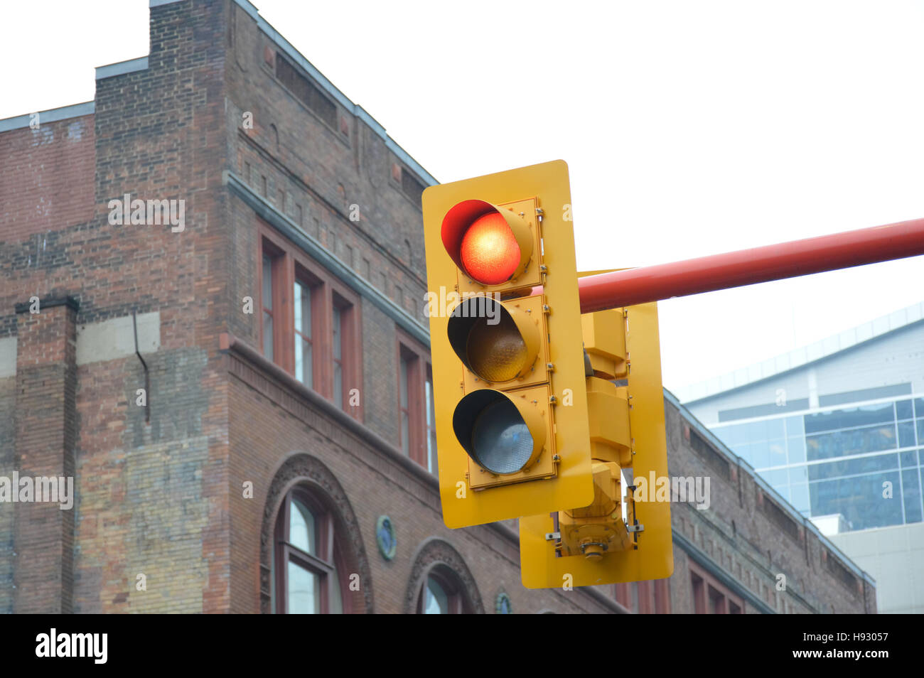 Traffic light in front of the old building in Toronto downtown. Red ...