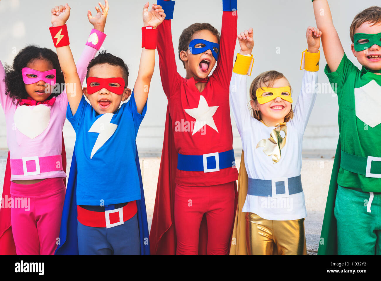 Superheroes Kids Teamwork Aspiration Elementary Concept Stock Photo - Alamy