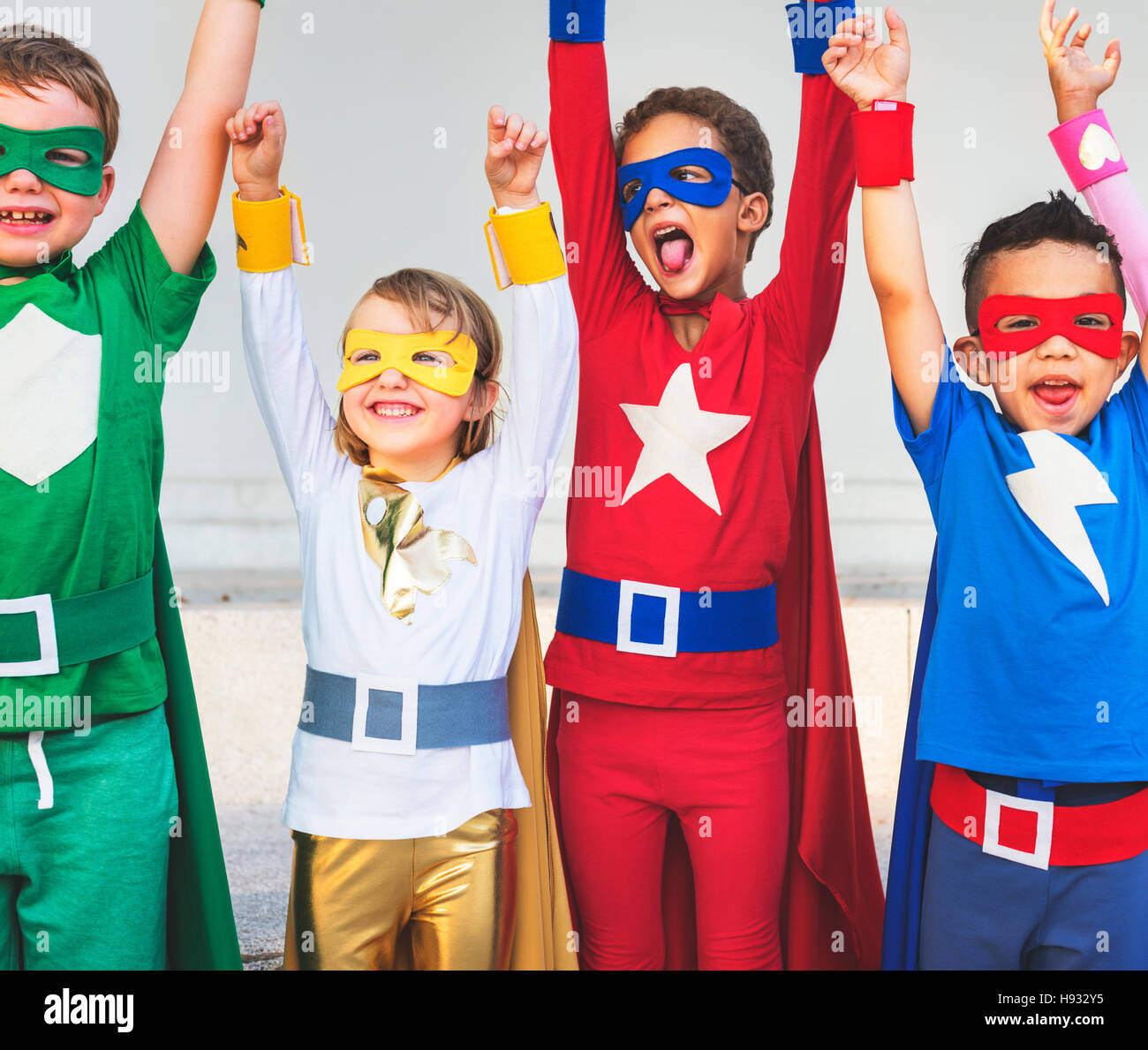 Superheroes Kids Teamwork Aspiration Elementary Concept Stock Photo - Alamy