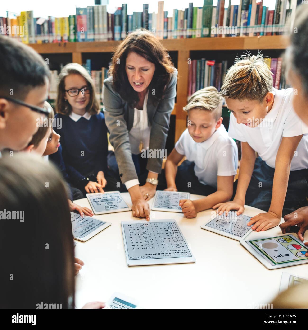 School Teacher Teaching Students Learning Concept Stock Photo - Alamy