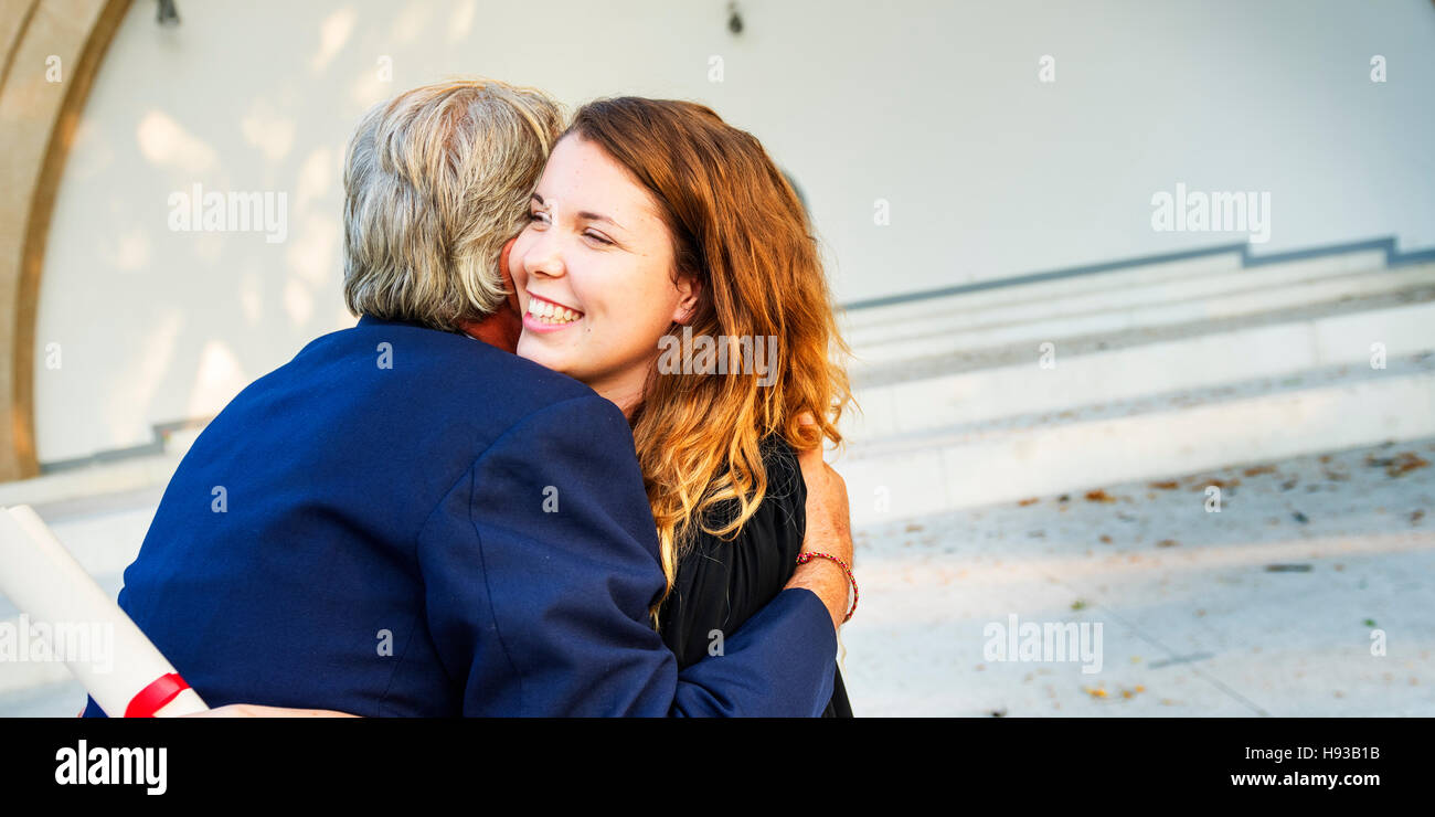 University Graduation Certificate Hugging Success Concept Stock Photo ...