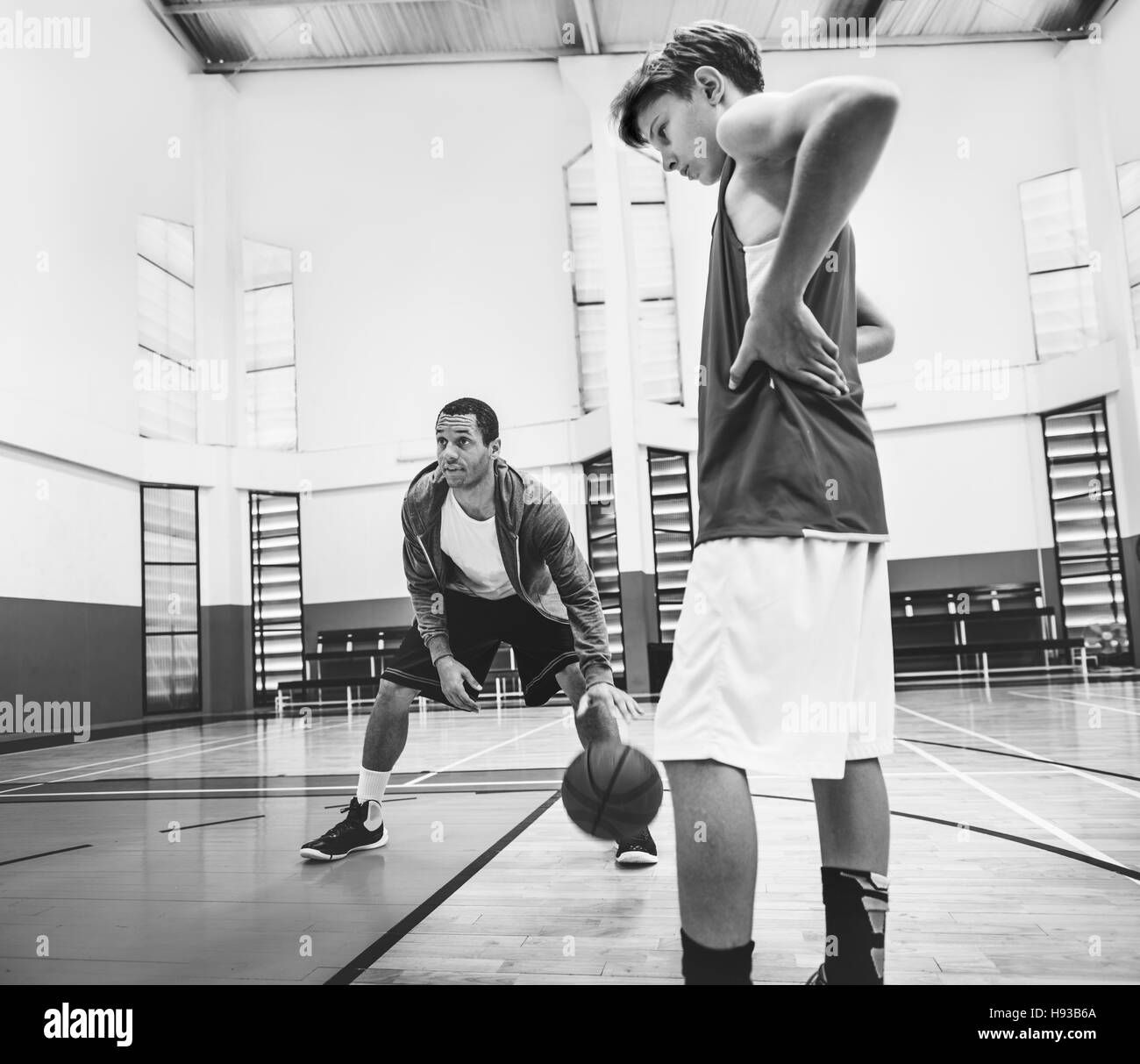 Basketball players and coach Black and White Stock Photos & Images - Alamy