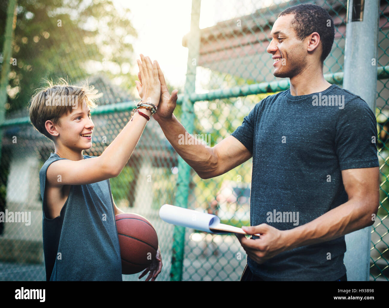 Trainer High-Five Teamwork Ability Concept Stock Photo - Alamy