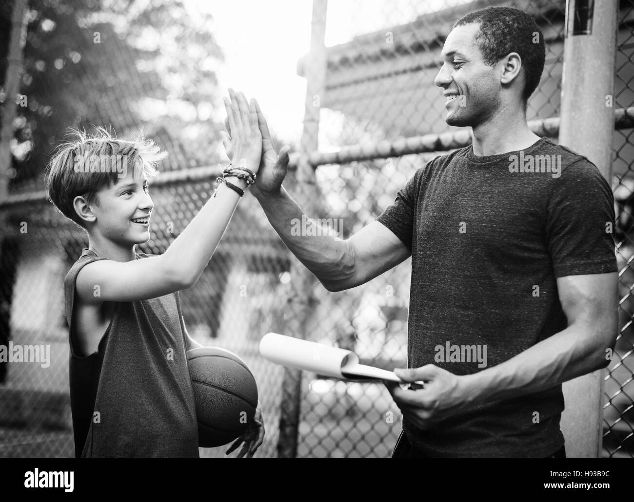 Trainer High-Five Teamwork Ability Concept Stock Photo - Alamy