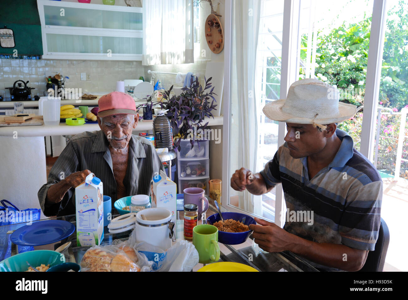Mexican father and son having breakfast, Acapulco, Mexico Stock Photo ...