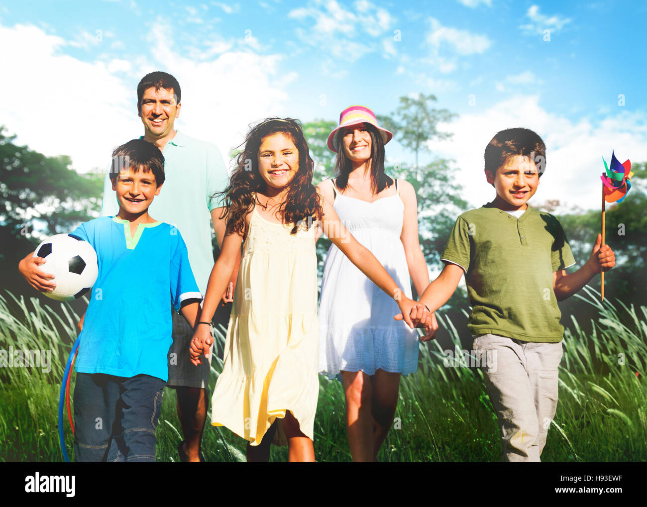 Family Playing Outdoors Children Field Concept Stock Photo - Alamy
