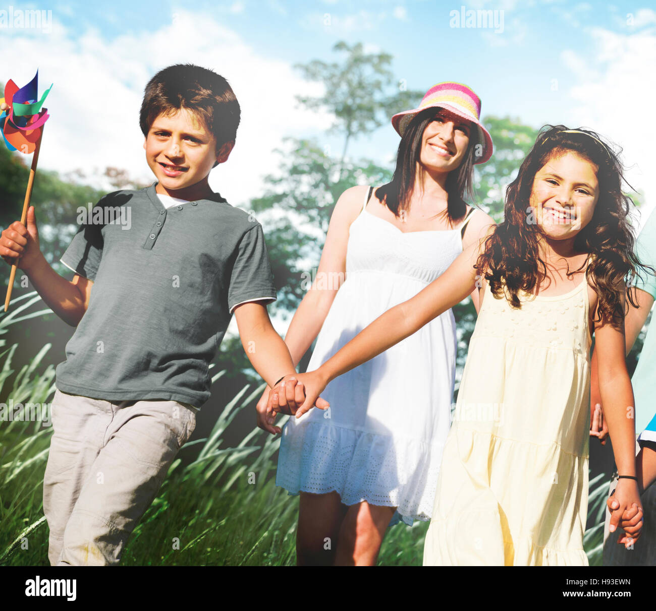 Family Playing Outdoors Children Field Concept Stock Photo - Alamy