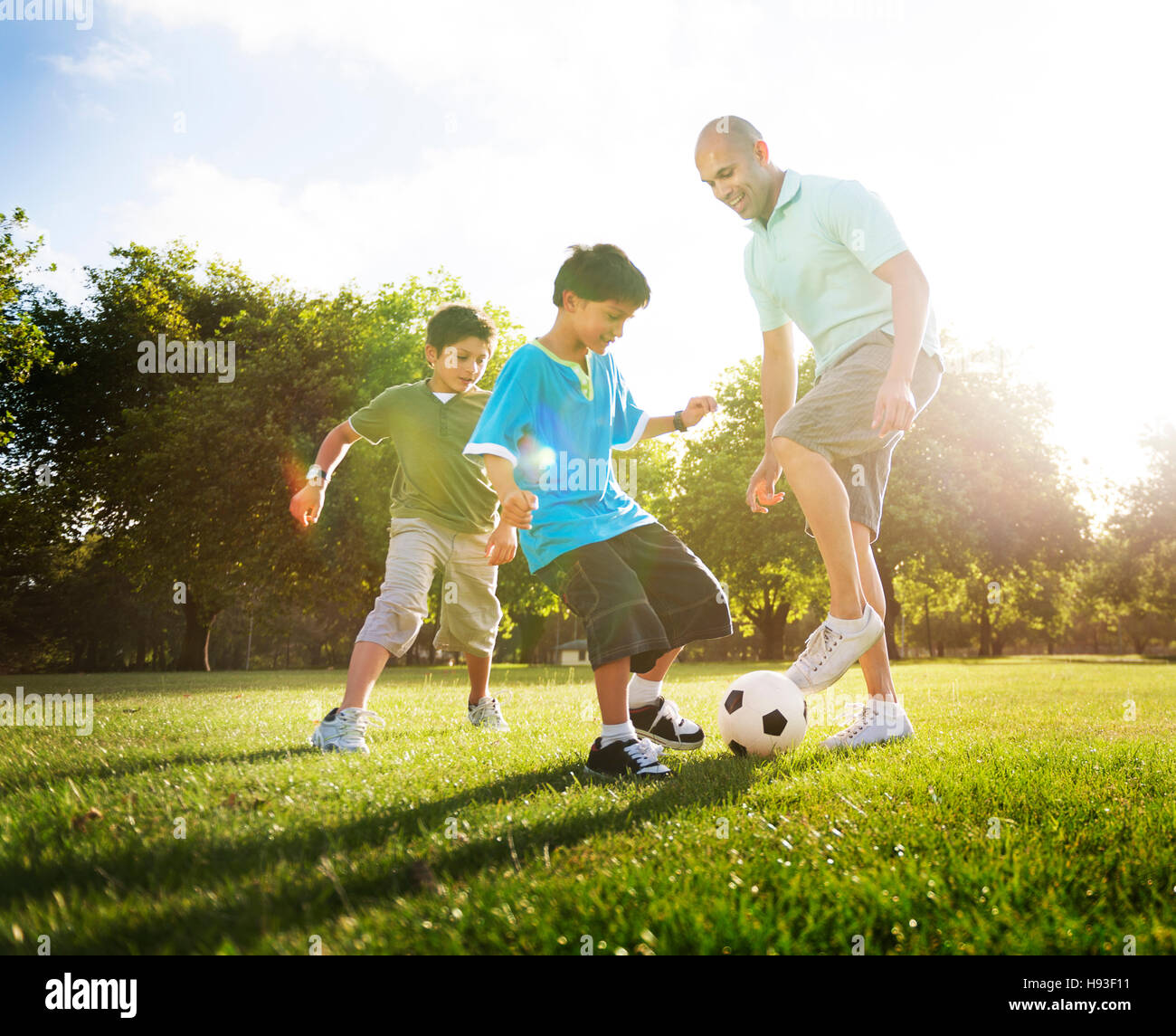 Soccer Fun Sports Family Playing Concept Stock Photo - Alamy