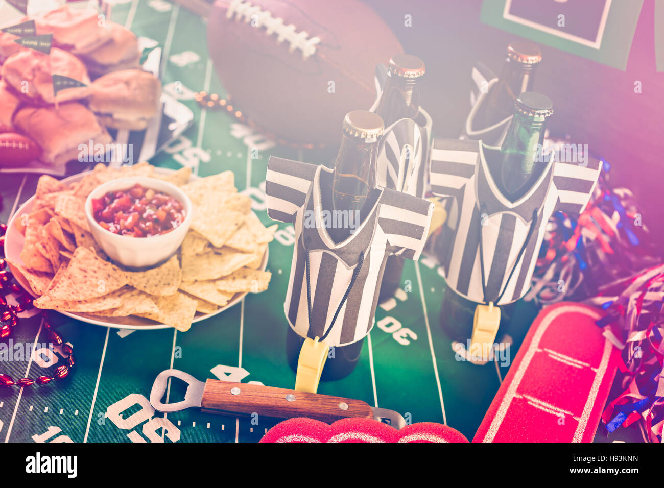 Game day football party table with beer, chips and salsa Stock Photo ...