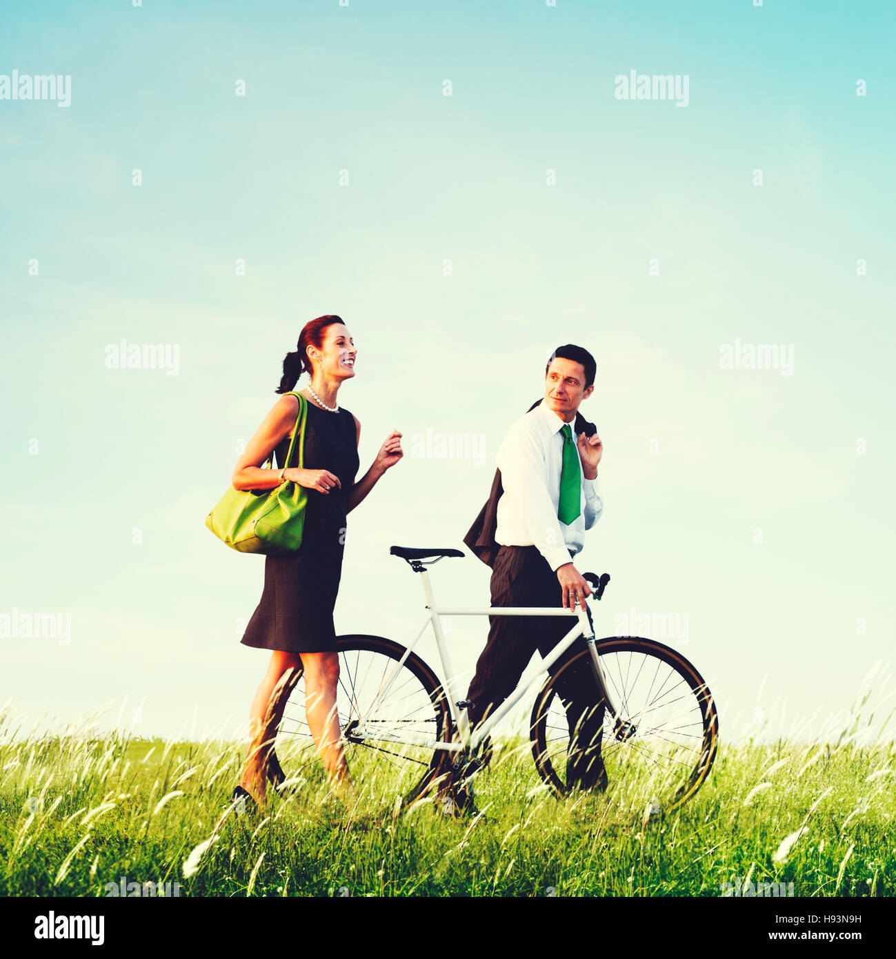 Business Man Woman Pushing Bike Concept Stock Photo - Alamy