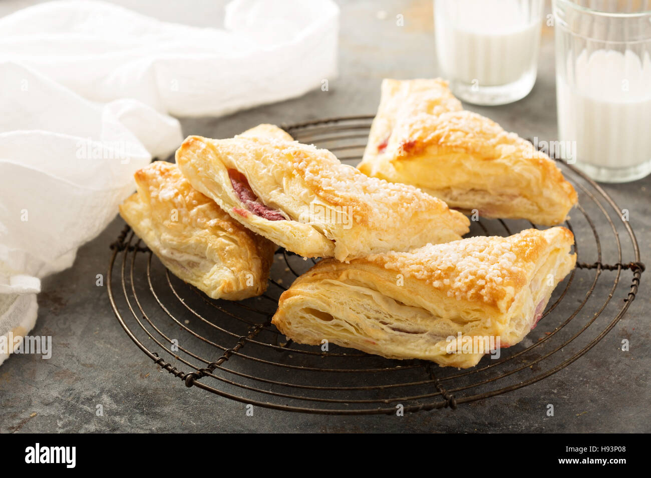Puff pastry with cherry filling Stock Photo - Alamy
