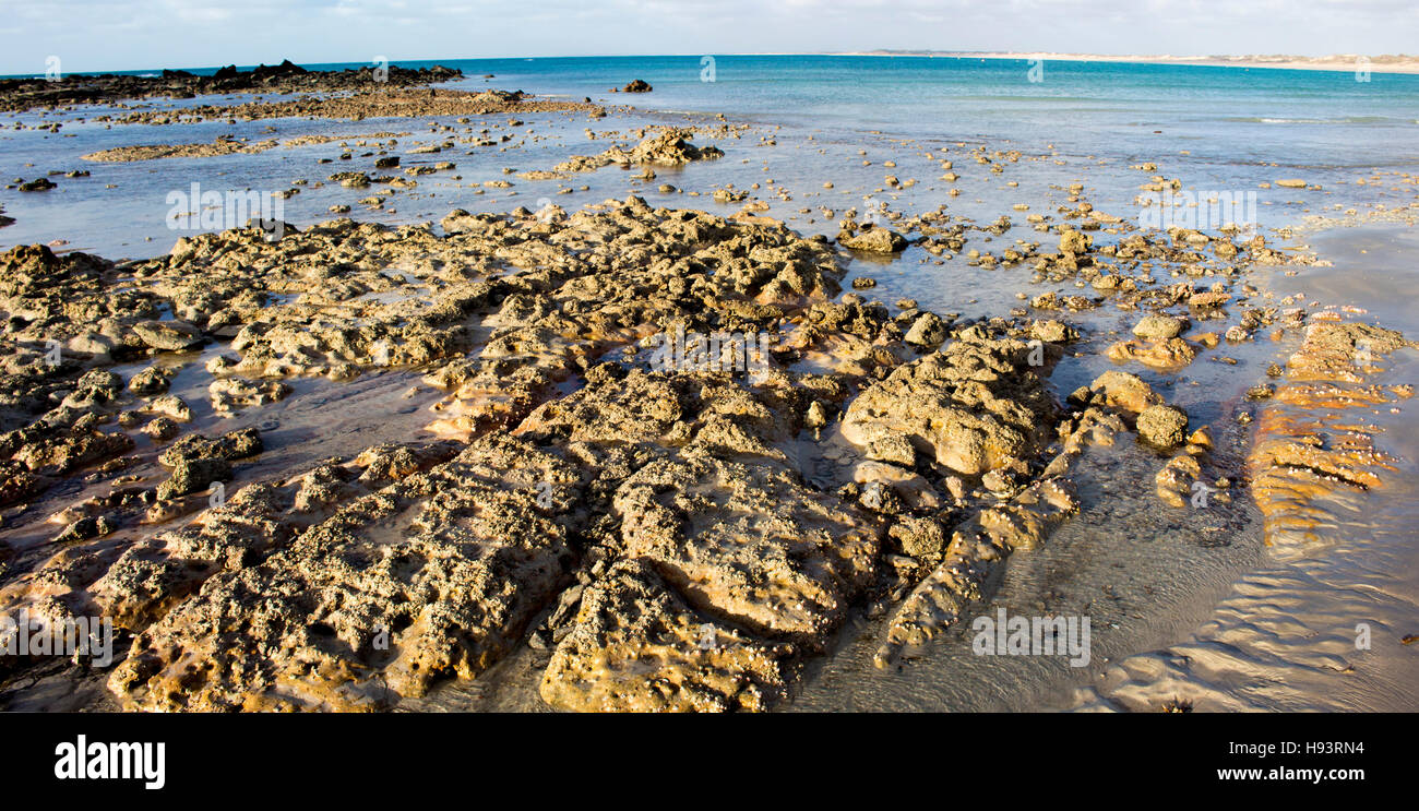 .Rugged sandstone rock formations on beautiful iconic Cable Beach ...