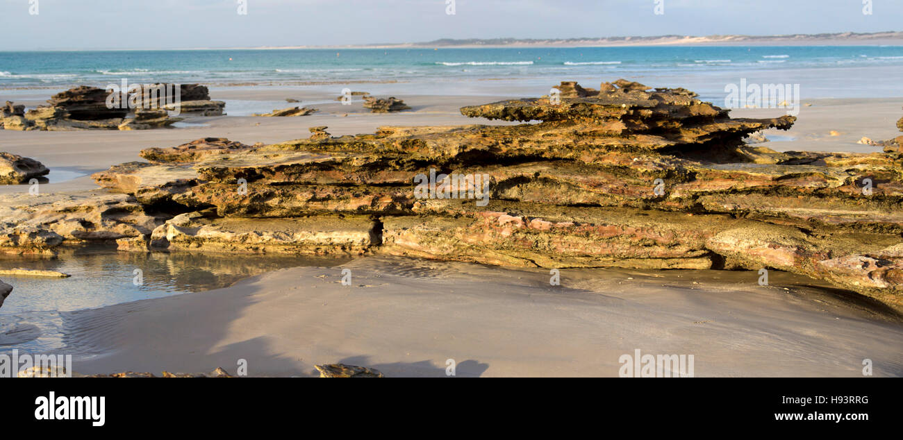 .Rugged sandstone rock formations on beautiful iconic Cable Beach ...