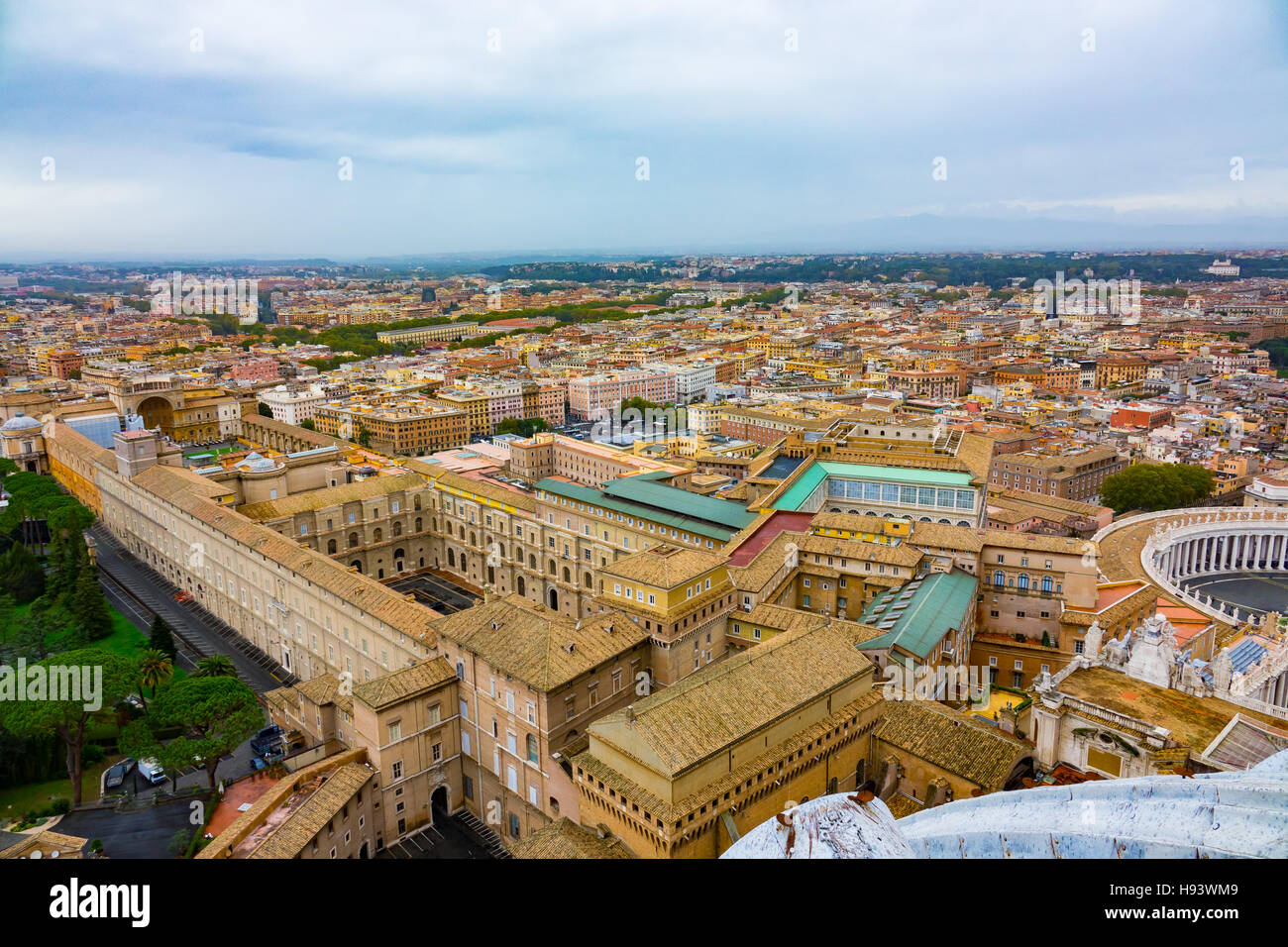 Wide angle aerial view over the city of Rome and the Vatican museums ...