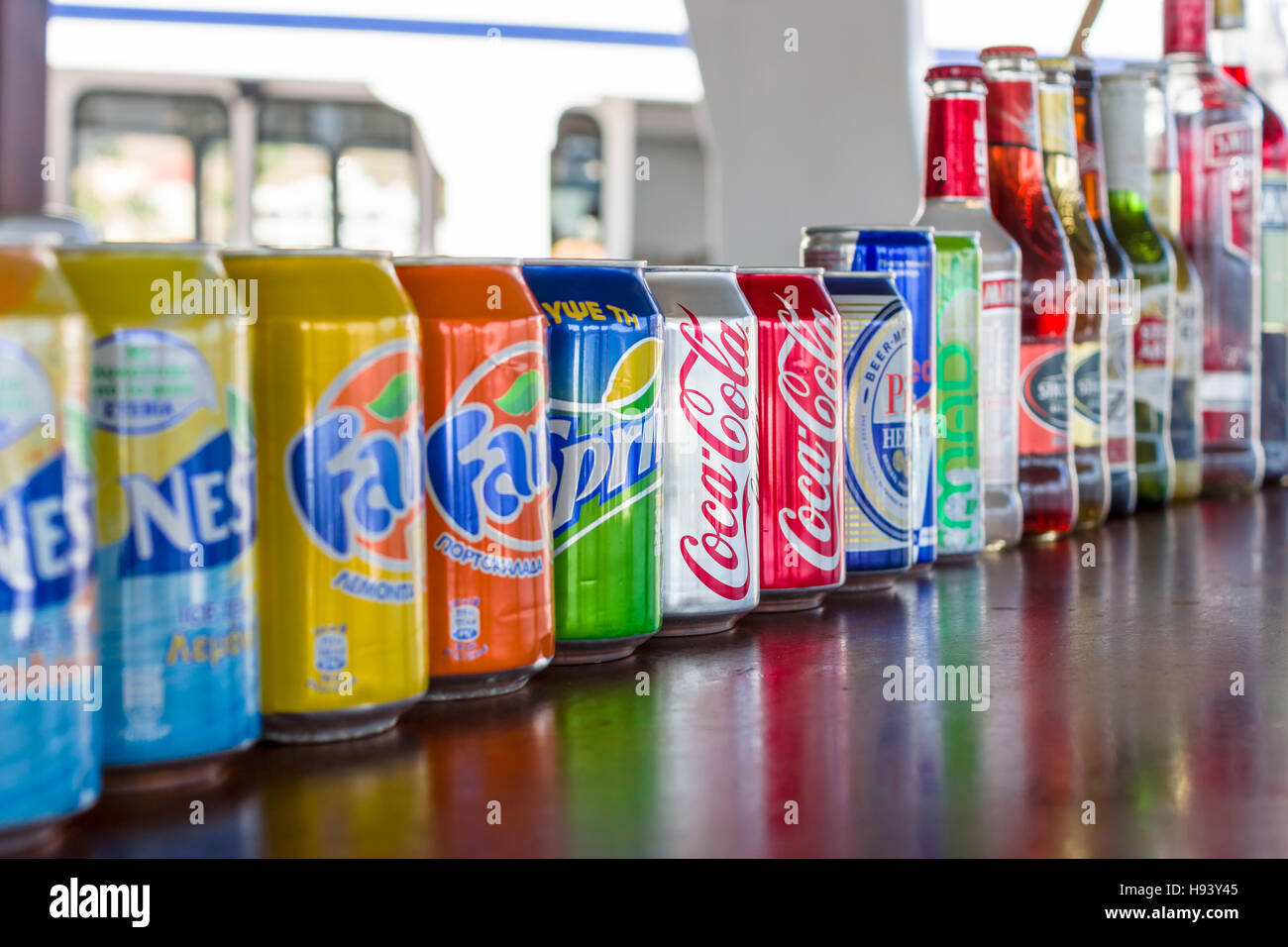 CRETE, GREECE - JULY 11, 2016: Tin cans and bottles of soft and ...