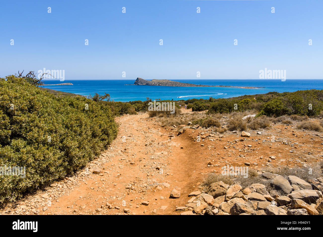 The dirt road strewn with large stones. The peninsula Kalydon. Crete ...