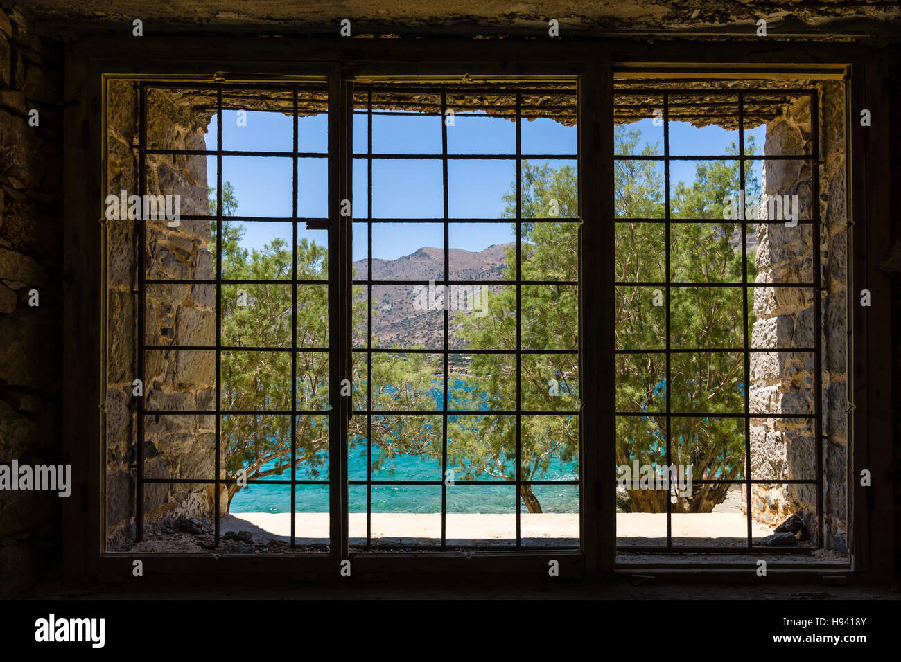 Seaview through the barred window Stock Photo - Alamy
