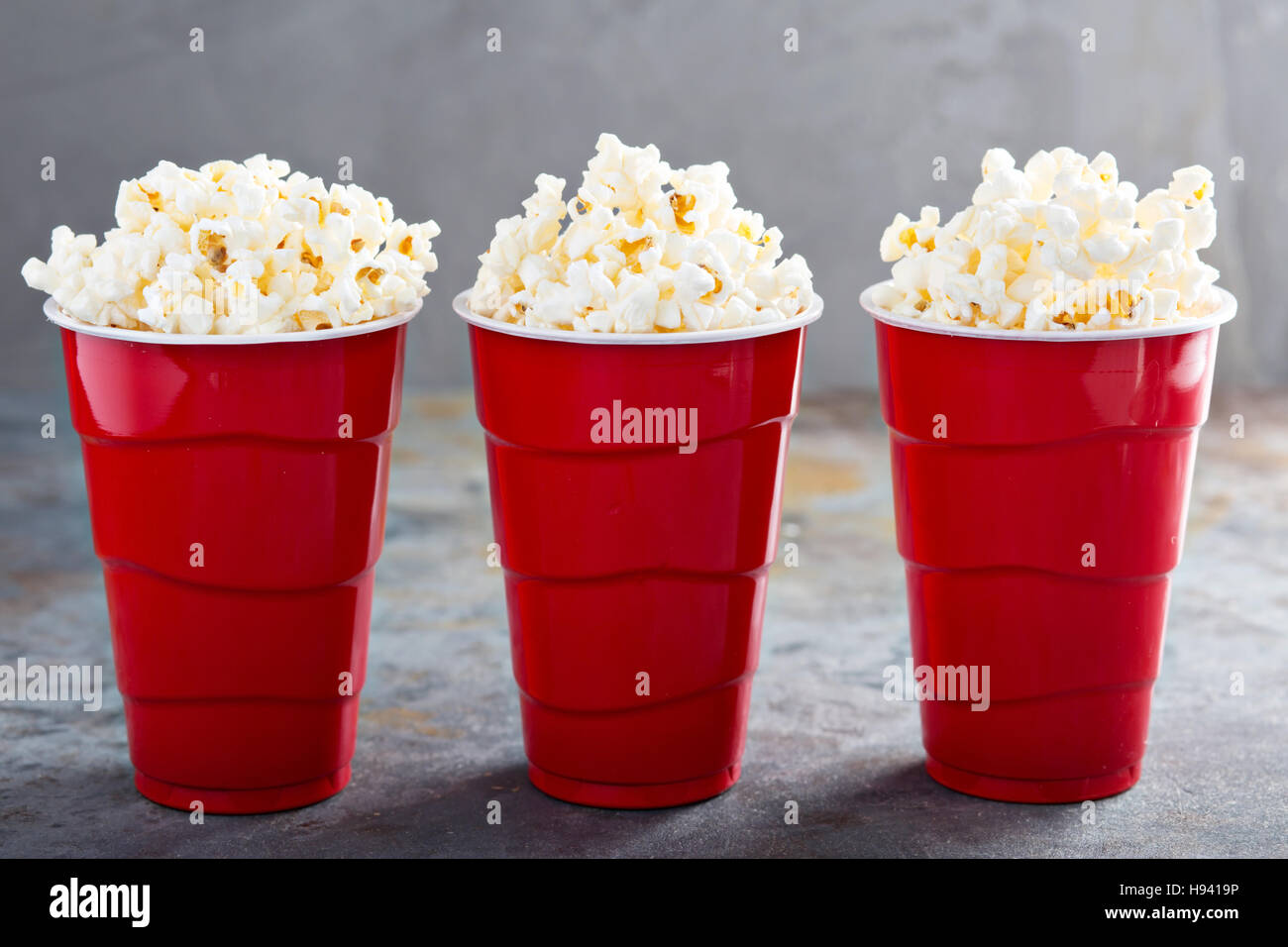 Popcorn in red cups Stock Photo - Alamy