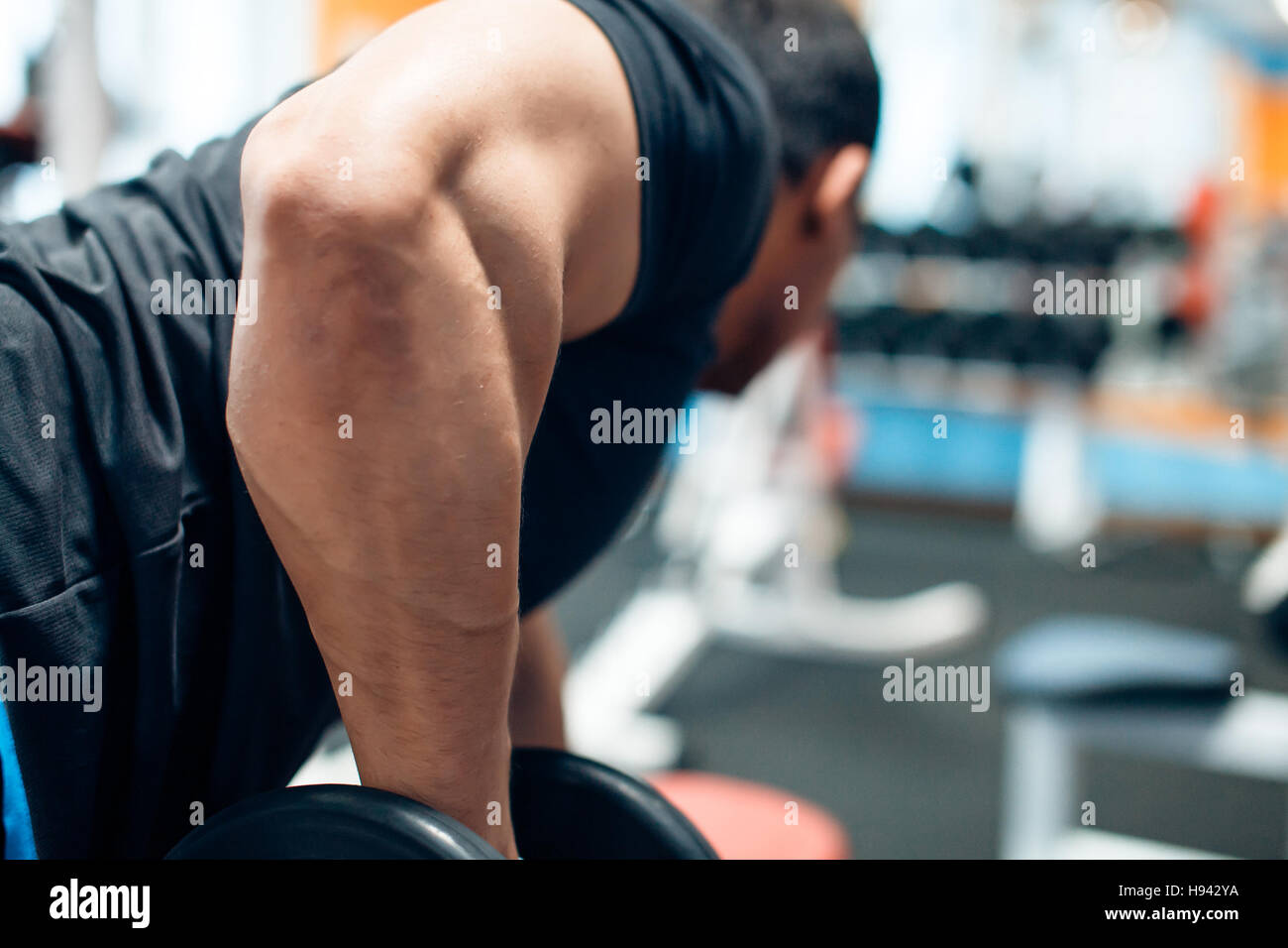 Flexing muscles in gym hi-res stock photography and images - Alamy