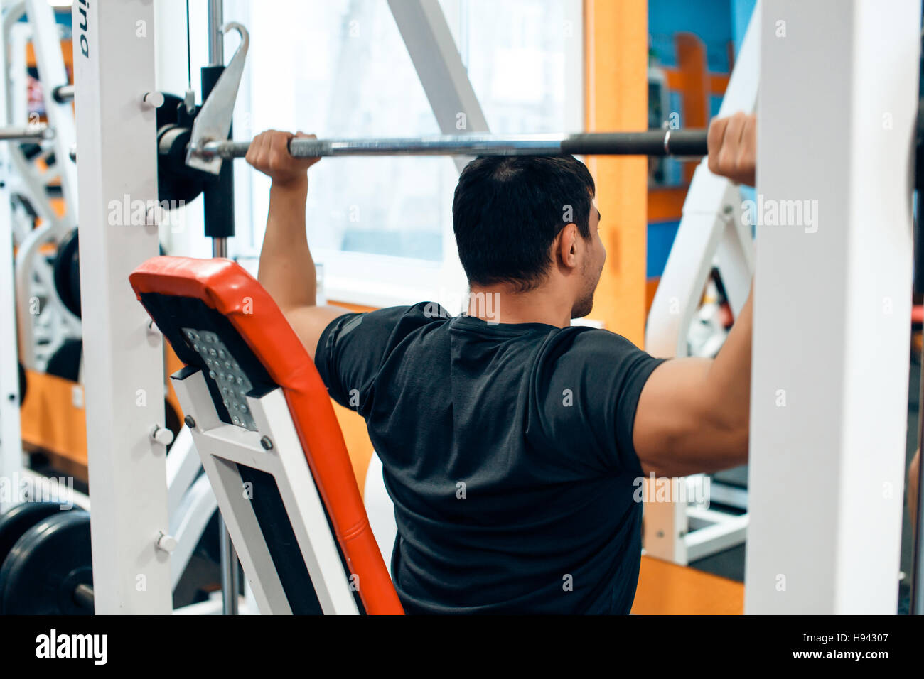 Athlete doing exercise for strengthening the shoulders Stock Photo - Alamy